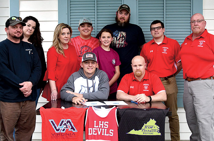 LHS senior Adam Wilmore signs letter of intent to wrestle at Averett ...